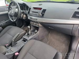 Pelēks Mitsubishi Lancer 2011 Jēkabpils, ar dzinēja tilpumu 1.80 L un nobraukumu 284 tūkst. km par 2800 €, foto 13 vietnē AUTOMOTO.COM.LV