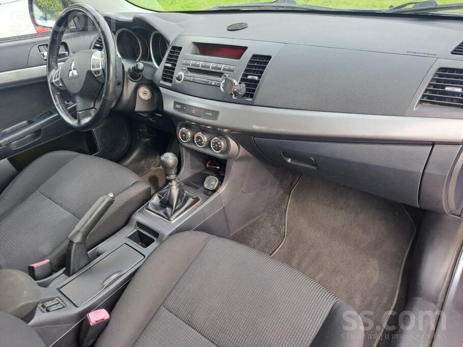 Pelēks Mitsubishi Lancer 2011 Jēkabpils, ar dzinēja tilpumu 1.80 L un nobraukumu 284 tūkst. km par 2800 €, foto 13 vietnē AUTOMOTO.COM.LV