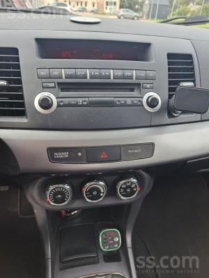 Pelēks Mitsubishi Lancer 2011 Jēkabpils, ar dzinēja tilpumu 1.80 L un nobraukumu 284 tūkst. km par 2800 €, foto 19 vietnē AUTOMOTO.COM.LV