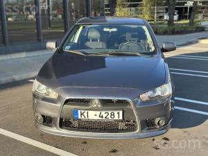 Pelēks Mitsubishi Lancer 2009 Rīga, ar dzinēja tilpumu 2.00 L un nobraukumu 255 tūkst. km par 2300 €, foto  vietnē AUTOMOTO.COM.LV