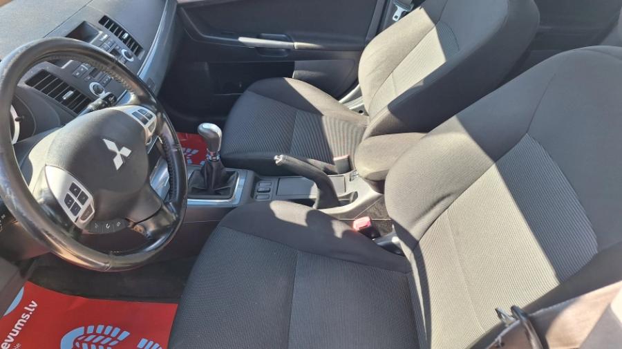 Pelēks Mitsubishi Lancer 2009 Rīga, ar dzinēja tilpumu 1.80 L un nobraukumu 269 tūkst. km par 3290 €, foto 6 vietnē AUTOMOTO.COM.LV