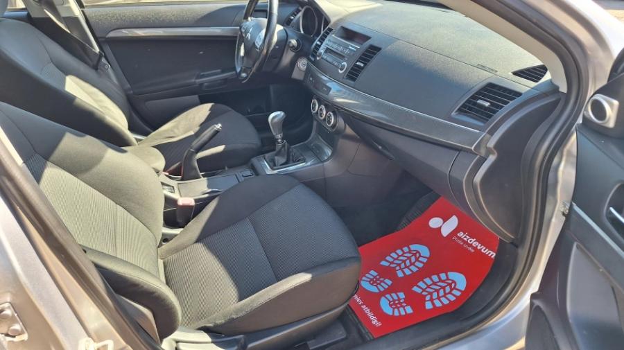 Pelēks Mitsubishi Lancer 2009 Rīga, ar dzinēja tilpumu 1.80 L un nobraukumu 269 tūkst. km par 3290 €, foto 12 vietnē AUTOMOTO.COM.LV