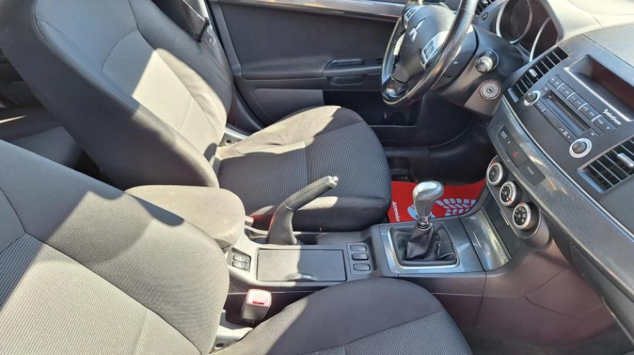 Pelēks Mitsubishi Lancer 2009 Rīga, ar dzinēja tilpumu 1.80 L un nobraukumu 269 tūkst. km par 3290 €, foto 13 vietnē AUTOMOTO.COM.LV