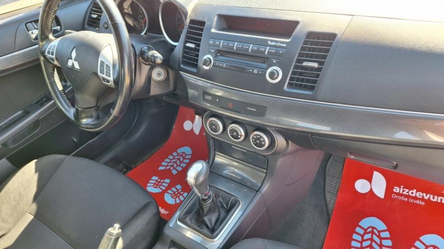 Pelēks Mitsubishi Lancer 2009 Rīga, ar dzinēja tilpumu 1.80 L un nobraukumu 269 tūkst. km par 3290 €, foto 14 vietnē AUTOMOTO.COM.LV