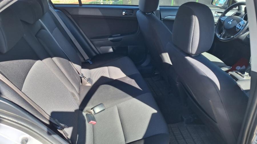 Pelēks Mitsubishi Lancer 2009 Rīga, ar dzinēja tilpumu 1.80 L un nobraukumu 269 tūkst. km par 3290 €, foto 16 vietnē AUTOMOTO.COM.LV
