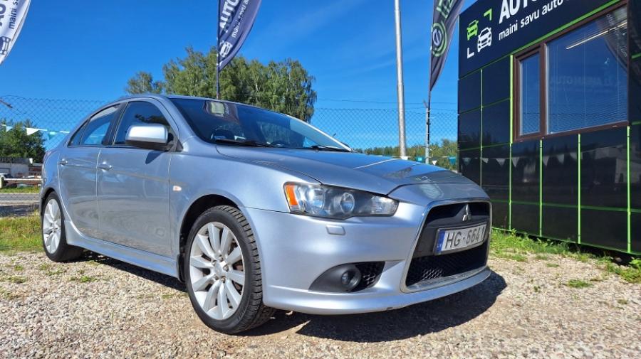 Pelēks Mitsubishi Lancer 2009 Rīga, ar dzinēja tilpumu 1.80 L un nobraukumu 269 tūkst. km par 3290 €, foto 19 vietnē AUTOMOTO.COM.LV