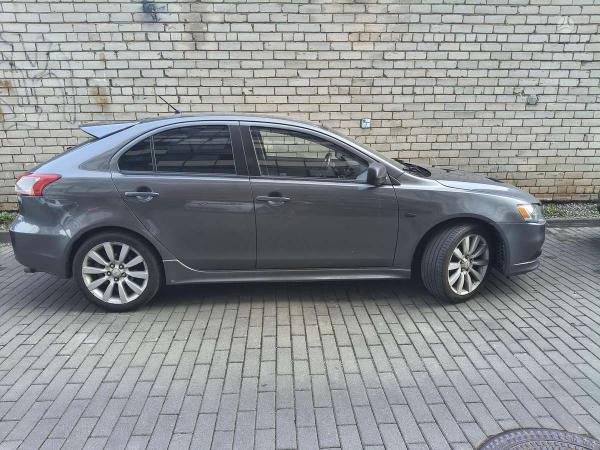 Pelēks Mitsubishi Lancer 2009 Panevēža, ar dzinēja tilpumu 1.97 L un nobraukumu 300 tūkst. km par 3000 €, foto 3 vietnē AUTOMOTO.COM.LV
