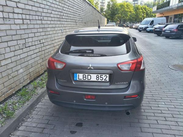 Pelēks Mitsubishi Lancer 2009 Panevēža, ar dzinēja tilpumu 1.97 L un nobraukumu 300 tūkst. km par 3000 €, foto 4 vietnē AUTOMOTO.COM.LV