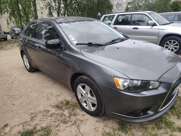 Grey Mitsubishi Lancer 2009 in Vilnius, with an engine capacity of 1.97 L and mileage of 307 thousand km for 3100 €, photo 2 on AUTOMOTO.COM.LV
