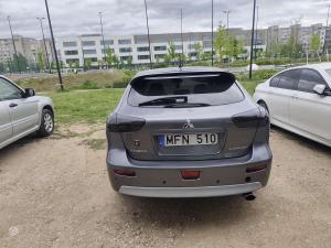 Grey Mitsubishi Lancer 2009 in Vilnius, with an engine capacity of 1.97 L and mileage of 307 thousand km for 3100 €, photo 5 on AUTOMOTO.COM.LV