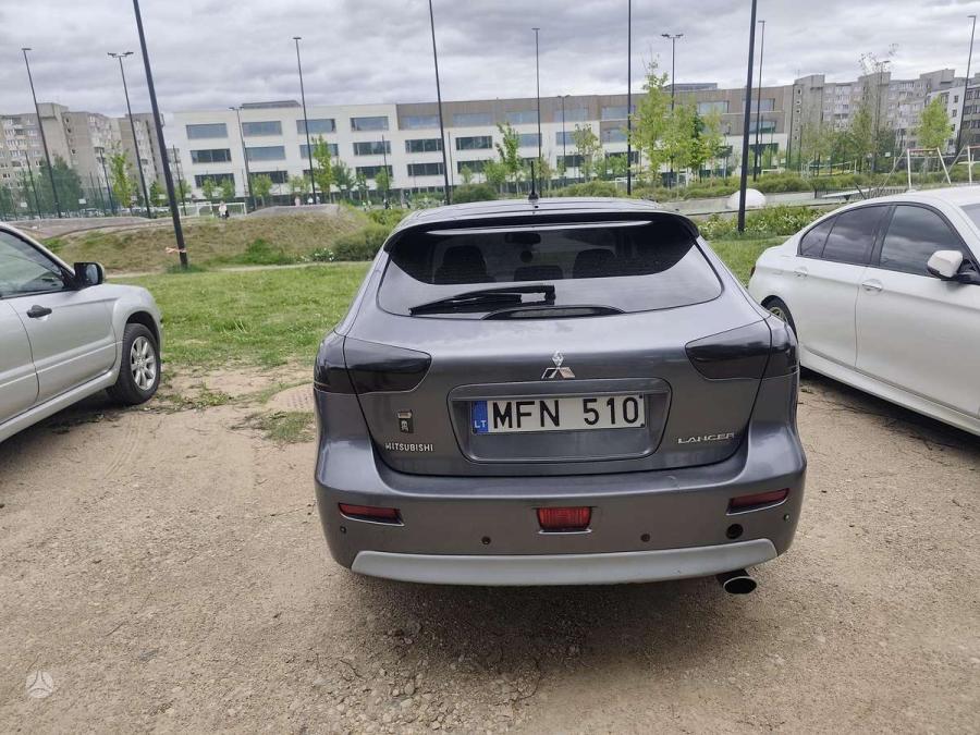 Grey Mitsubishi Lancer 2009 in Vilnius, with an engine capacity of 1.97 L and mileage of 307 thousand km for 3100 €, photo 5 on AUTOMOTO.COM.LV