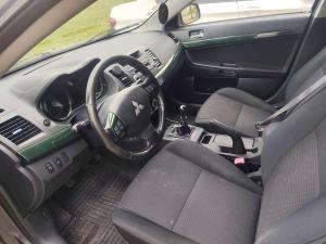 Grey Mitsubishi Lancer 2009 in Vilnius, with an engine capacity of 1.97 L and mileage of 307 thousand km for 3100 €, photo 7 on AUTOMOTO.COM.LV