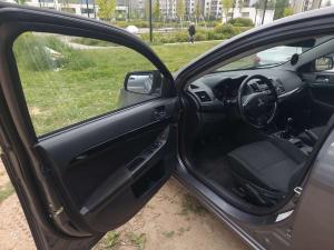 Grey Mitsubishi Lancer 2009 in Vilnius, with an engine capacity of 1.97 L and mileage of 307 thousand km for 3100 €, photo 10 on AUTOMOTO.COM.LV