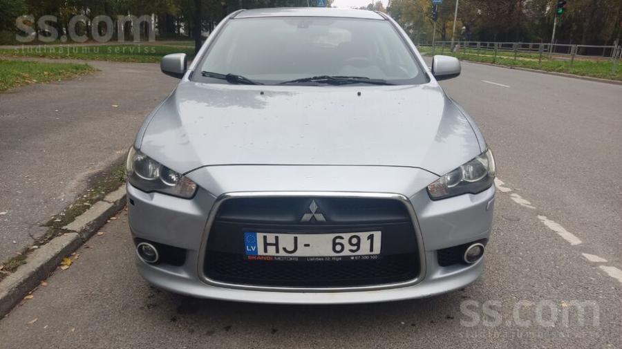 Pelēks Mitsubishi Lancer 2009 Rīga, ar dzinēja tilpumu 1.80 L un nobraukumu 134 tūkst. km par 3000 €, foto 4 vietnē AUTOMOTO.COM.LV