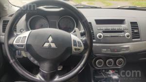 Pelēks Mitsubishi Lancer 2009 Rīga, ar dzinēja tilpumu 1.80 L un nobraukumu 134 tūkst. km par 3000 €, foto 7 vietnē AUTOMOTO.COM.LV