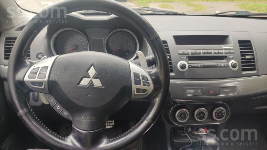 Pelēks Mitsubishi Lancer 2009 Rīga, ar dzinēja tilpumu 1.80 L un nobraukumu 134 tūkst. km par 3000 €, foto 7 vietnē AUTOMOTO.COM.LV