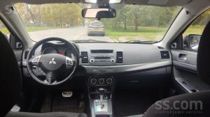 Pelēks Mitsubishi Lancer 2009 Rīga, ar dzinēja tilpumu 1.80 L un nobraukumu 134 tūkst. km par 3000 €, foto 9 vietnē AUTOMOTO.COM.LV