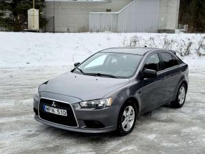 Grey Mitsubishi Lancer 2010 in Vilnius, with an engine capacity of 2.00 L and mileage of 290 thousand km for 2500 €, photo 2 on AUTOMOTO.COM.LV