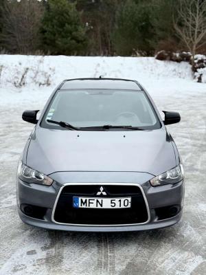 Grey Mitsubishi Lancer 2010 in Vilnius, with an engine capacity of 2.00 L and mileage of 290 thousand km for 2500 €, photo 3 on AUTOMOTO.COM.LV