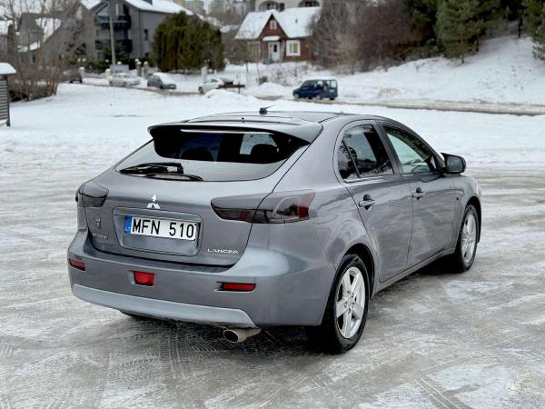 Grey Mitsubishi Lancer 2010 in Vilnius, with an engine capacity of 2.00 L and mileage of 290 thousand km for 2500 €, photo 4 on AUTOMOTO.COM.LV
