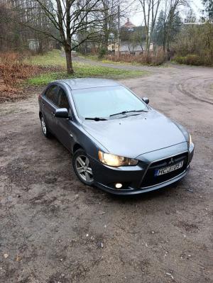 Grey Mitsubishi Lancer 2010 in Vilnius, with an engine capacity of 2.00 L and mileage of 320 thousand km for 1850 €, photo  on AUTOMOTO.COM.LV