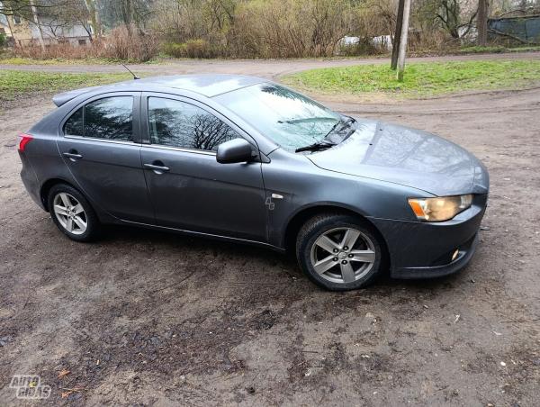 Pelēks Mitsubishi Lancer 2010 Viļņa, ar dzinēja tilpumu 2.00 L un nobraukumu 320 tūkst. km par 1850 €, foto 3 vietnē AUTOMOTO.COM.LV