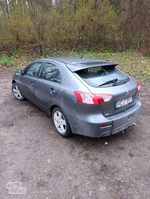 Grey Mitsubishi Lancer 2010 in Vilnius, with an engine capacity of 2.00 L and mileage of 320 thousand km for 1850 €, photo 6 on AUTOMOTO.COM.LV