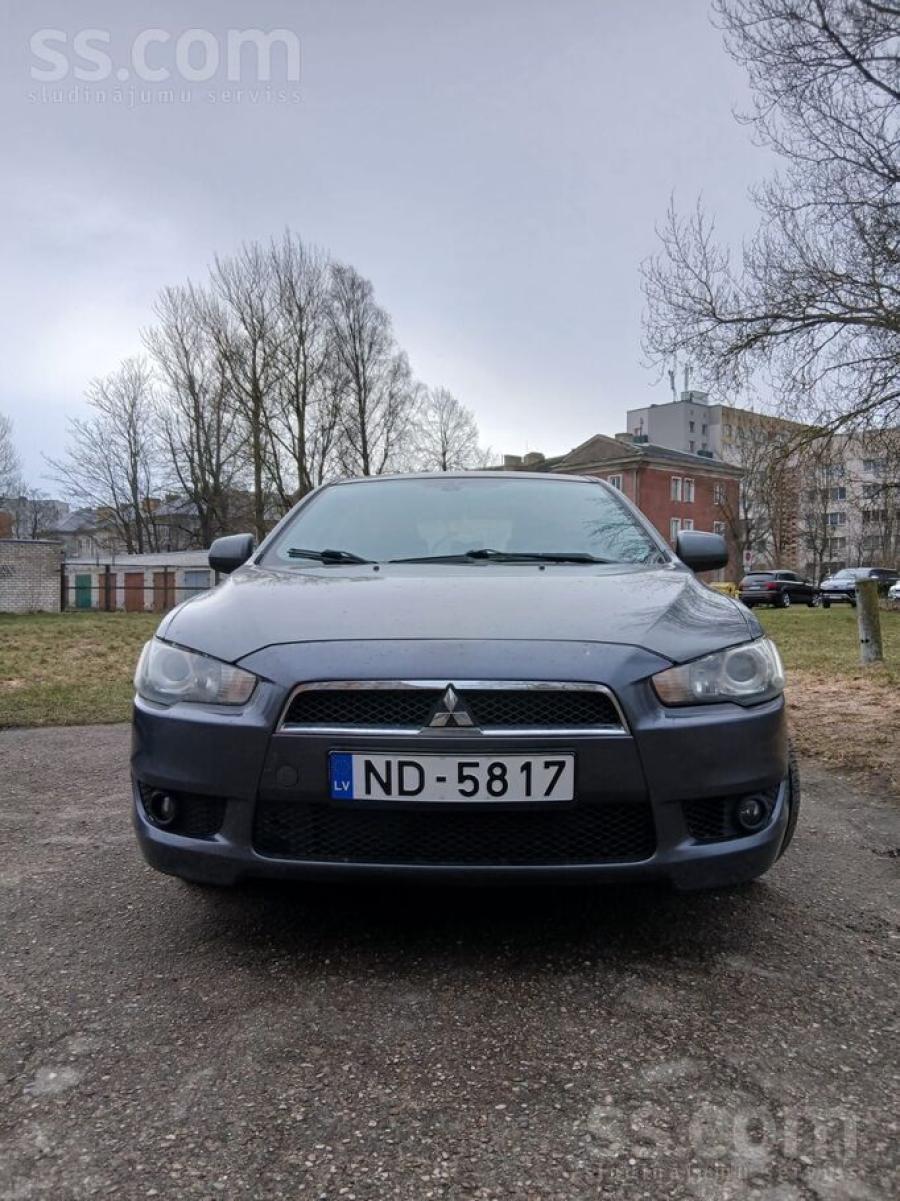 Pelēks Mitsubishi Lancer 2010 Liepāja, ar dzinēja tilpumu 2.00 L un nobraukumu 295 tūkst. km par 2100 €, foto 1 vietnē AUTOMOTO.COM.LV