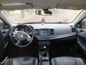 Pelēks Mitsubishi Lancer 2010 Liepāja, ar dzinēja tilpumu 2.00 L un nobraukumu 295 tūkst. km par 2100 €, foto 4 vietnē AUTOMOTO.COM.LV