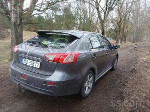 Pelēks Mitsubishi Lancer 2010 Liepāja, ar dzinēja tilpumu 2.00 L un nobraukumu 295 tūkst. km par 2100 €, foto 5 vietnē AUTOMOTO.COM.LV
