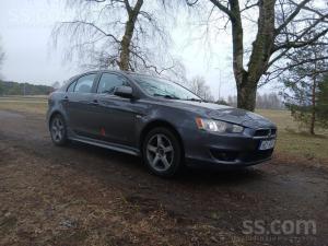 Pelēks Mitsubishi Lancer 2010 Liepāja, ar dzinēja tilpumu 2.00 L un nobraukumu 295 tūkst. km par 2100 €, foto 6 vietnē AUTOMOTO.COM.LV