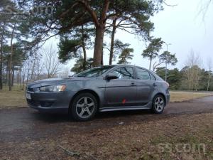 Pelēks Mitsubishi Lancer 2010 Liepāja, ar dzinēja tilpumu 2.00 L un nobraukumu 295 tūkst. km par 2100 €, foto 7 vietnē AUTOMOTO.COM.LV