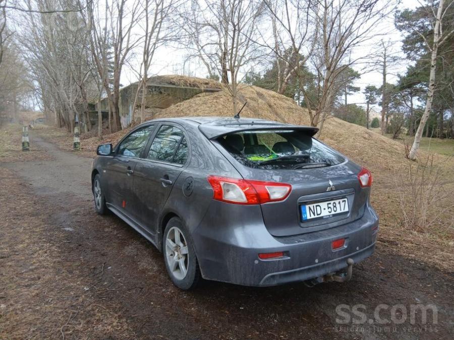 Pelēks Mitsubishi Lancer 2010 Liepāja, ar dzinēja tilpumu 2.00 L un nobraukumu 295 tūkst. km par 2100 €, foto 8 vietnē AUTOMOTO.COM.LV