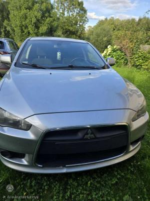 Grey Mitsubishi Lancer 2010 in Vilnius, with an engine capacity of 1.80 L and mileage of 104 thousand km for 4000 €, photo  on AUTOMOTO.COM.LV