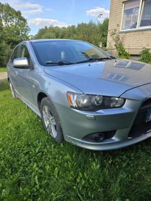 Pelēks Mitsubishi Lancer 2010 Viļņa, ar dzinēja tilpumu 1.80 L un nobraukumu 104 tūkst. km par 4000 €, foto 3 vietnē AUTOMOTO.COM.LV