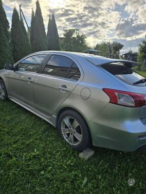 Pelēks Mitsubishi Lancer 2010 Viļņa, ar dzinēja tilpumu 1.80 L un nobraukumu 104 tūkst. km par 4000 €, foto 5 vietnē AUTOMOTO.COM.LV