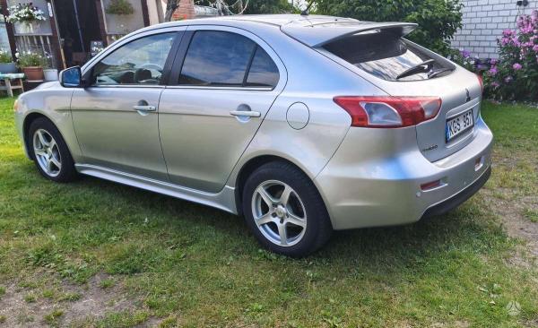 Grey Mitsubishi Lancer 2010 in Mazeikiai, with an engine capacity of 1.80 L and mileage of 199 thousand km for 4000 €, photo 4 on AUTOMOTO.COM.LV
