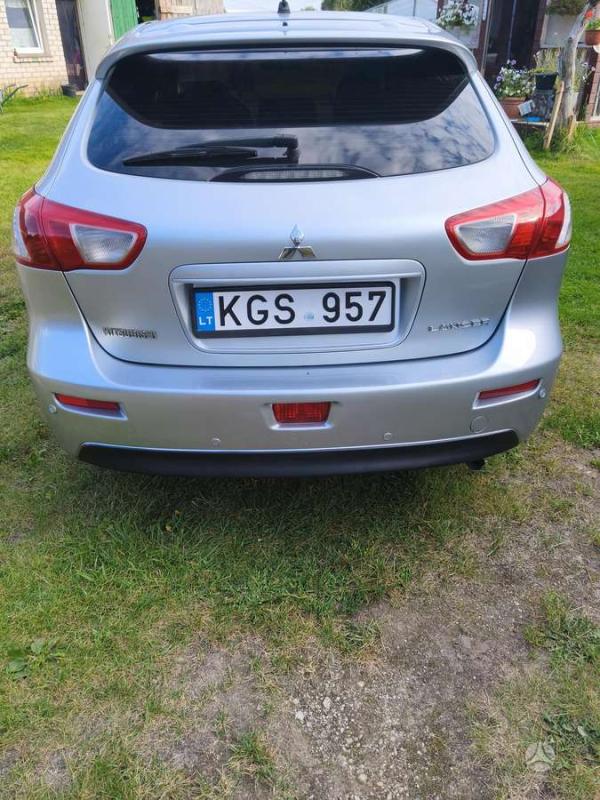 Grey Mitsubishi Lancer 2010 in Mazeikiai, with an engine capacity of 1.80 L and mileage of 199 thousand km for 4000 €, photo 5 on AUTOMOTO.COM.LV
