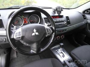 Pelēks Mitsubishi Lancer 2010 Rīga, ar dzinēja tilpumu 1.80 L un nobraukumu 185 tūkst. km par 3550 €, foto 8 vietnē AUTOMOTO.COM.LV