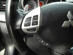 Pelēks Mitsubishi Lancer 2010 Rīga, ar dzinēja tilpumu 1.80 L un nobraukumu 185 tūkst. km par 3550 €, foto 13 vietnē AUTOMOTO.COM.LV