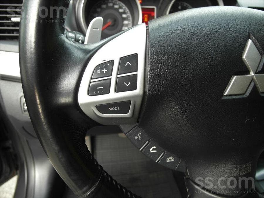 Pelēks Mitsubishi Lancer 2010 Rīga, ar dzinēja tilpumu 1.80 L un nobraukumu 185 tūkst. km par 3550 €, foto 13 vietnē AUTOMOTO.COM.LV