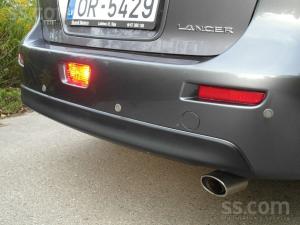 Pelēks Mitsubishi Lancer 2010 Rīga, ar dzinēja tilpumu 1.80 L un nobraukumu 185 tūkst. km par 3550 €, foto 23 vietnē AUTOMOTO.COM.LV