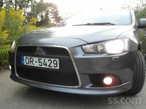 Pelēks Mitsubishi Lancer 2010 Rīga, ar dzinēja tilpumu 1.80 L un nobraukumu 185 tūkst. km par 3550 €, foto 26 vietnē AUTOMOTO.COM.LV