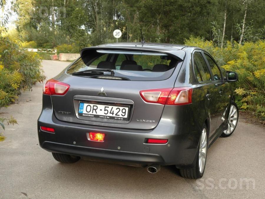 Pelēks Mitsubishi Lancer 2010 Rīga, ar dzinēja tilpumu 1.80 L un nobraukumu 185 tūkst. km par 3550 €, foto 28 vietnē AUTOMOTO.COM.LV