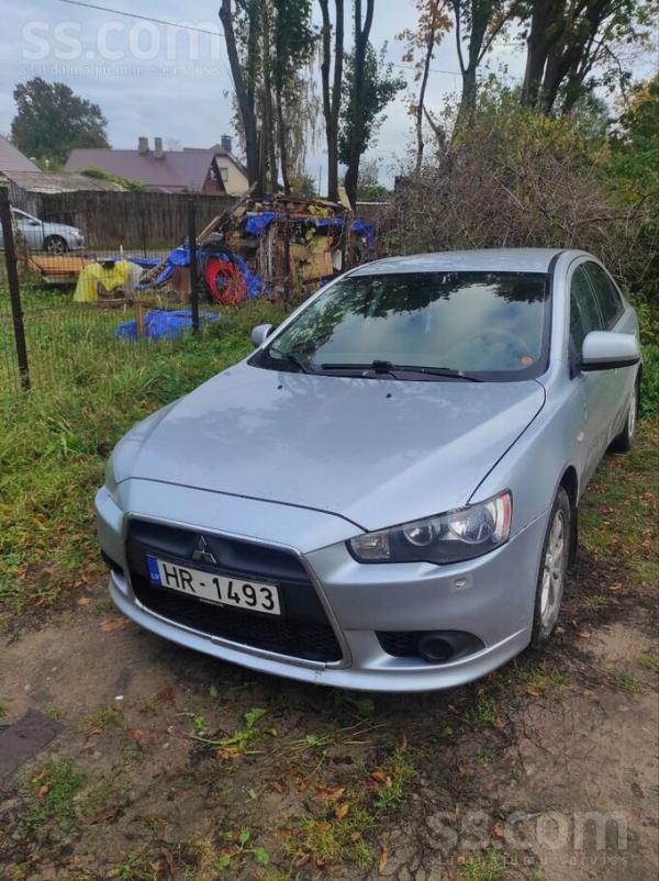 Pelēks Mitsubishi Lancer 2011 Rīga, ar dzinēja tilpumu 1.80 L un nobraukumu 279 tūkst. km par 2700 €, foto 1 vietnē AUTOMOTO.COM.LV