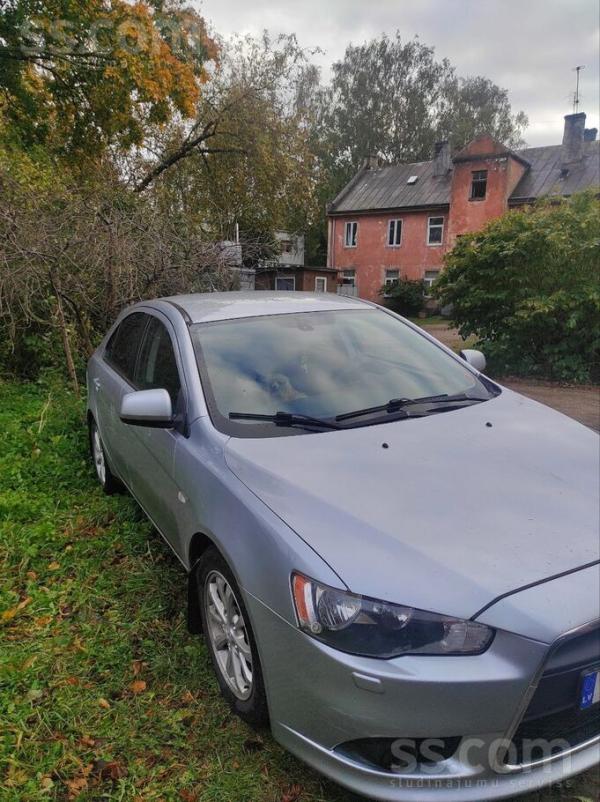 Pelēks Mitsubishi Lancer 2011 Rīga, ar dzinēja tilpumu 1.80 L un nobraukumu 279 tūkst. km par 2700 €, foto 2 vietnē AUTOMOTO.COM.LV