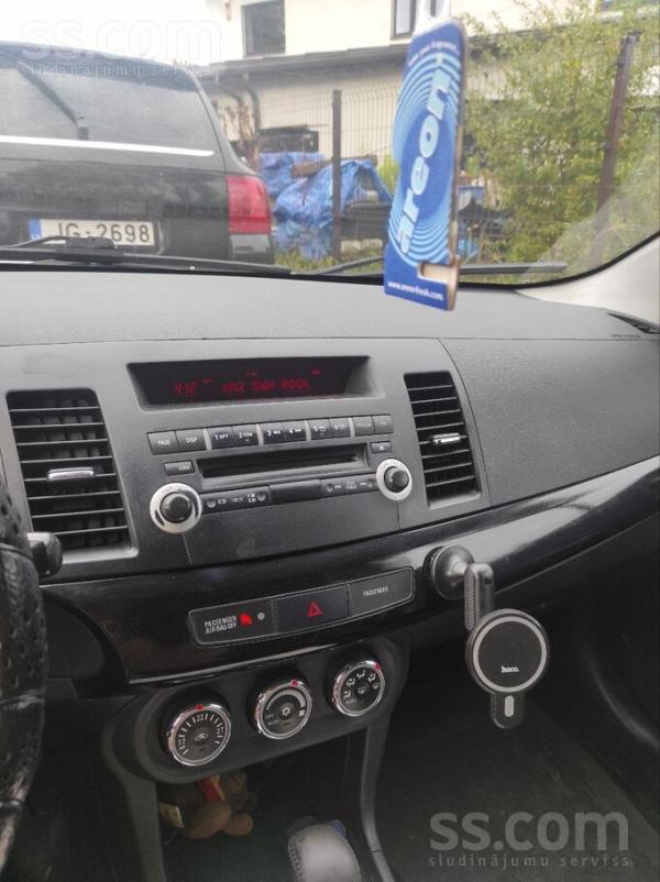 Pelēks Mitsubishi Lancer 2011 Rīga, ar dzinēja tilpumu 1.80 L un nobraukumu 279 tūkst. km par 2700 €, foto 5 vietnē AUTOMOTO.COM.LV