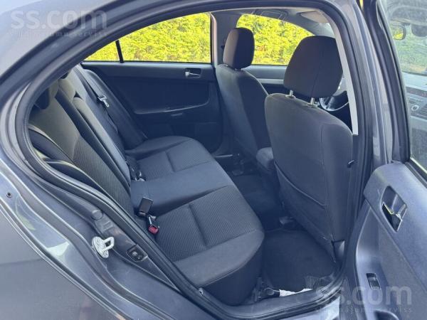 Pelēks Mitsubishi Lancer 2011 Rīga, ar dzinēja tilpumu 1.80 L un nobraukumu 284 tūkst. km par 2200 €, foto 6 vietnē AUTOMOTO.COM.LV
