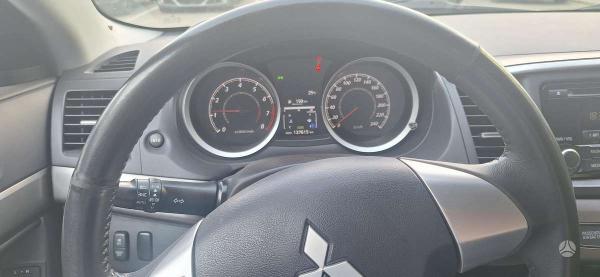 Grey Mitsubishi Lancer 2014 in Vilnius, with an engine capacity of 1.59 L and mileage of 128 thousand km for 4300 €, photo 1 on AUTOMOTO.COM.LV