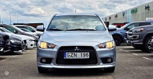 Pelēks Mitsubishi Lancer 2014 Viļņa, ar dzinēja tilpumu 1.59 L un nobraukumu 128 tūkst. km par 4950 €, foto 4 vietnē AUTOMOTO.COM.LV